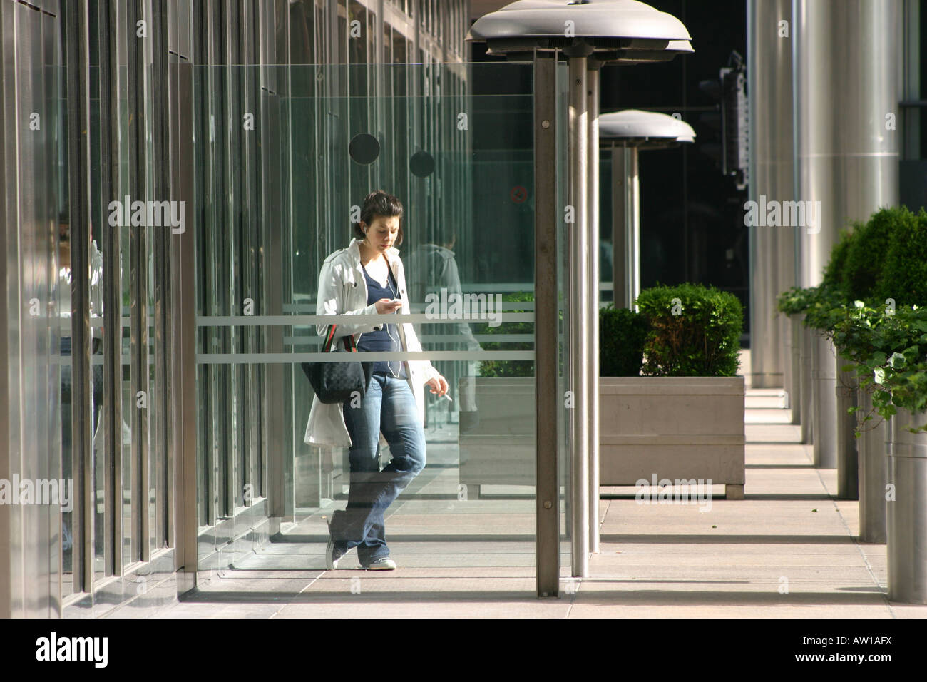 female smoker taking fag smoking break with phone Stock Photo - Alamy