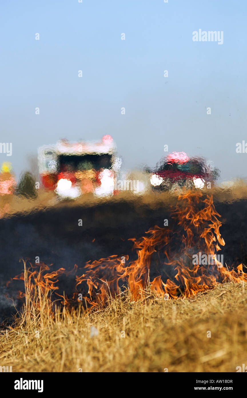 Fire truck arrives at a grass fire burning south of Shakopee, Minnesota ...