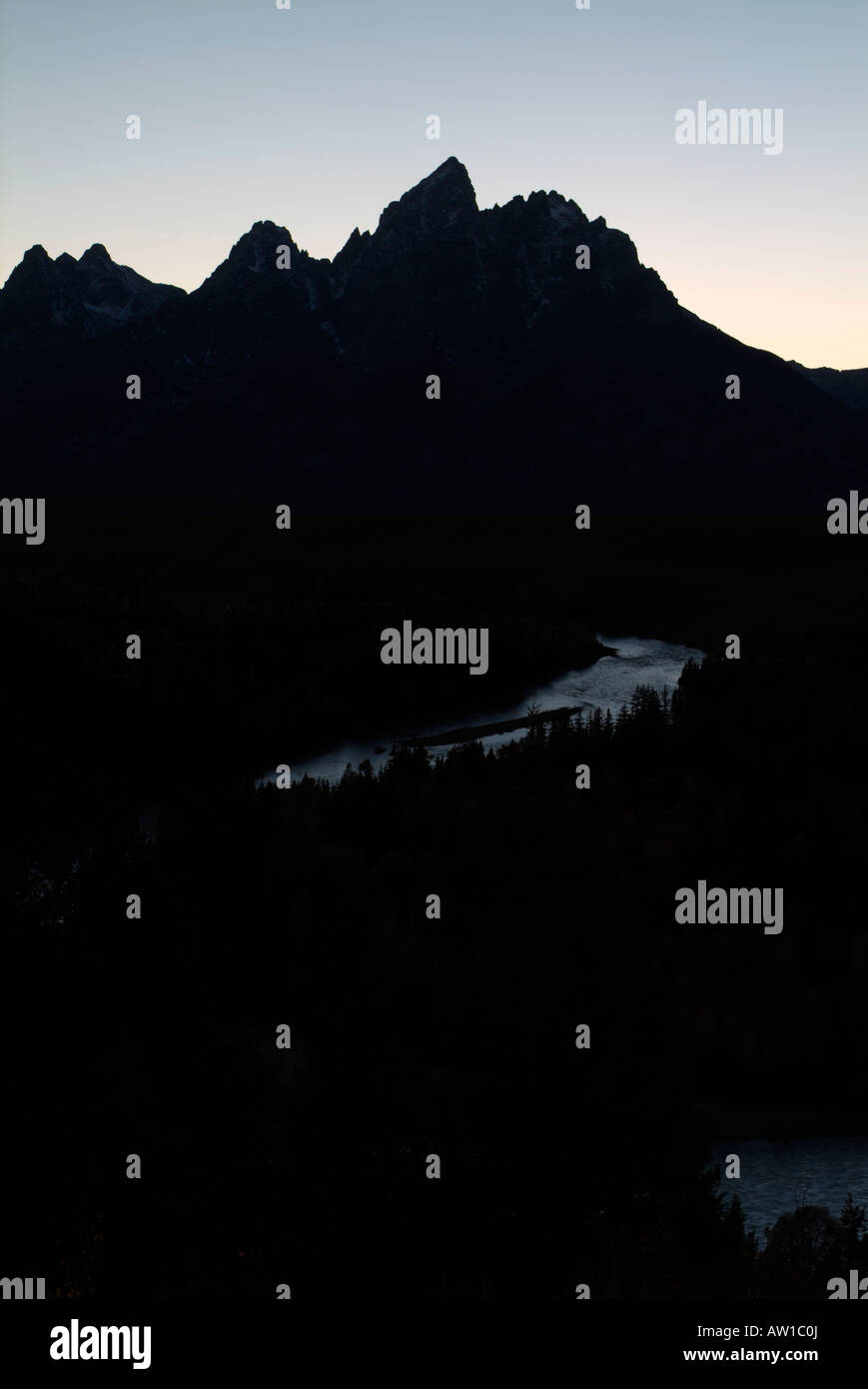 Sunset silhouette of the Cathedral Group at the snake river overlook ...