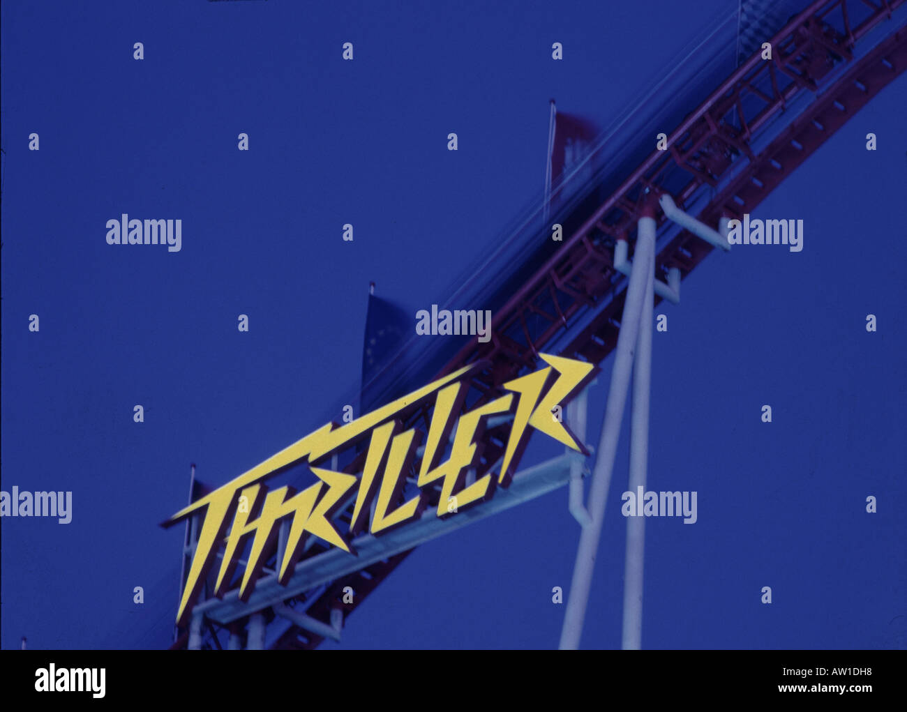 Thriller logo at a fun fair with Helter Skelter Stock Photo - Alamy