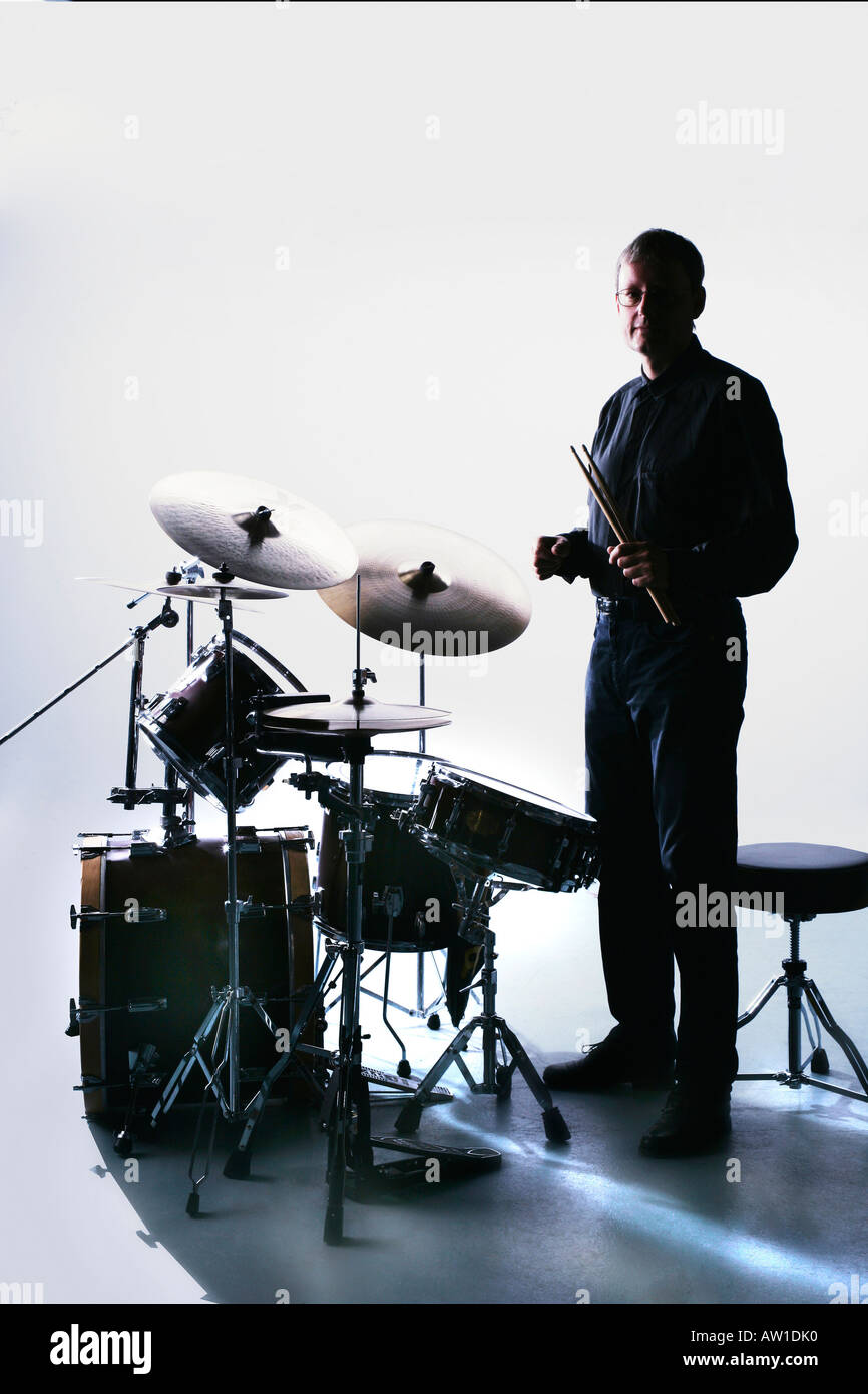 Drummer in Studio with Drums Stock Photo - Alamy