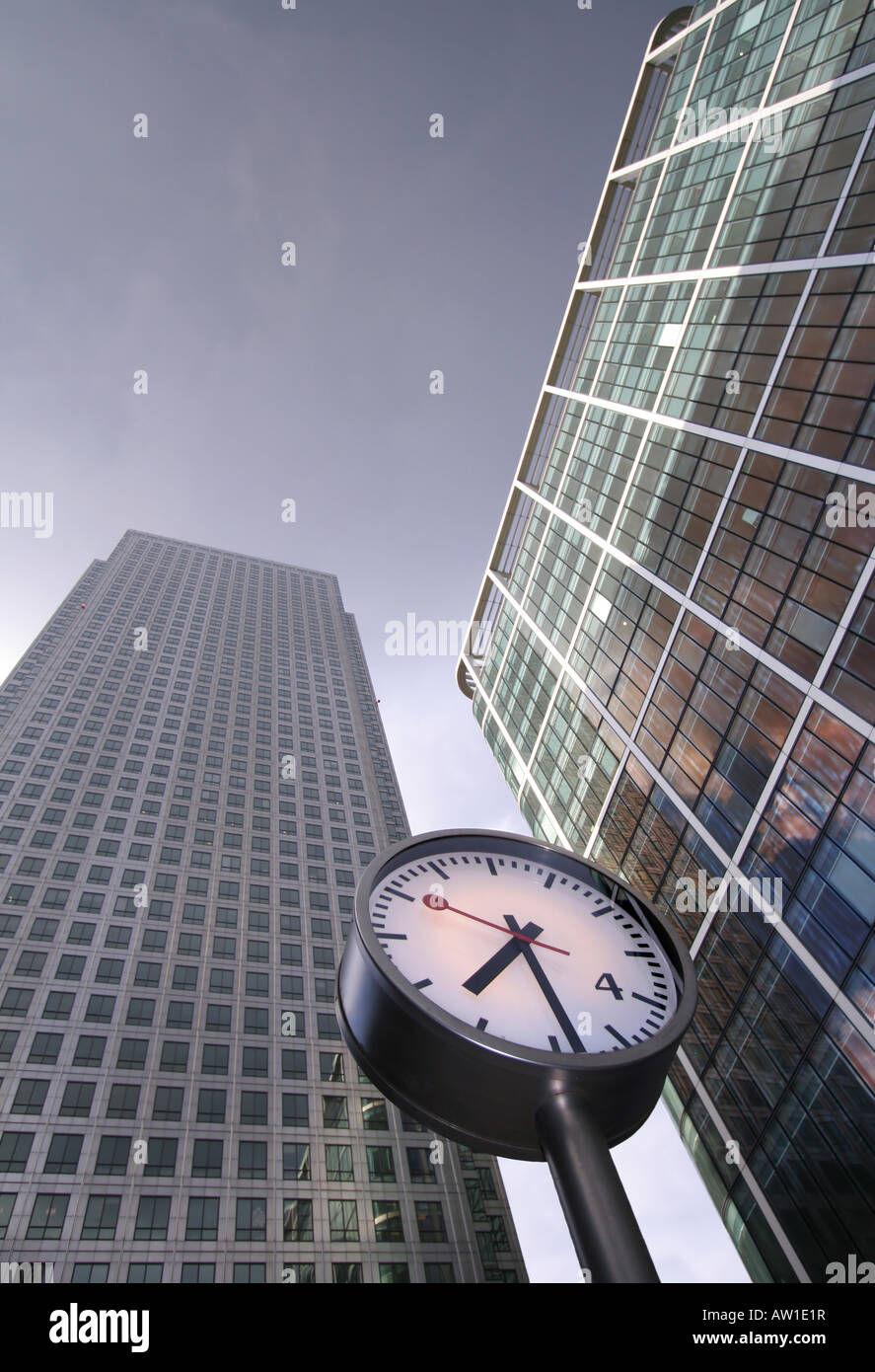 Clock in front of office buildings London Stock Photo - Alamy