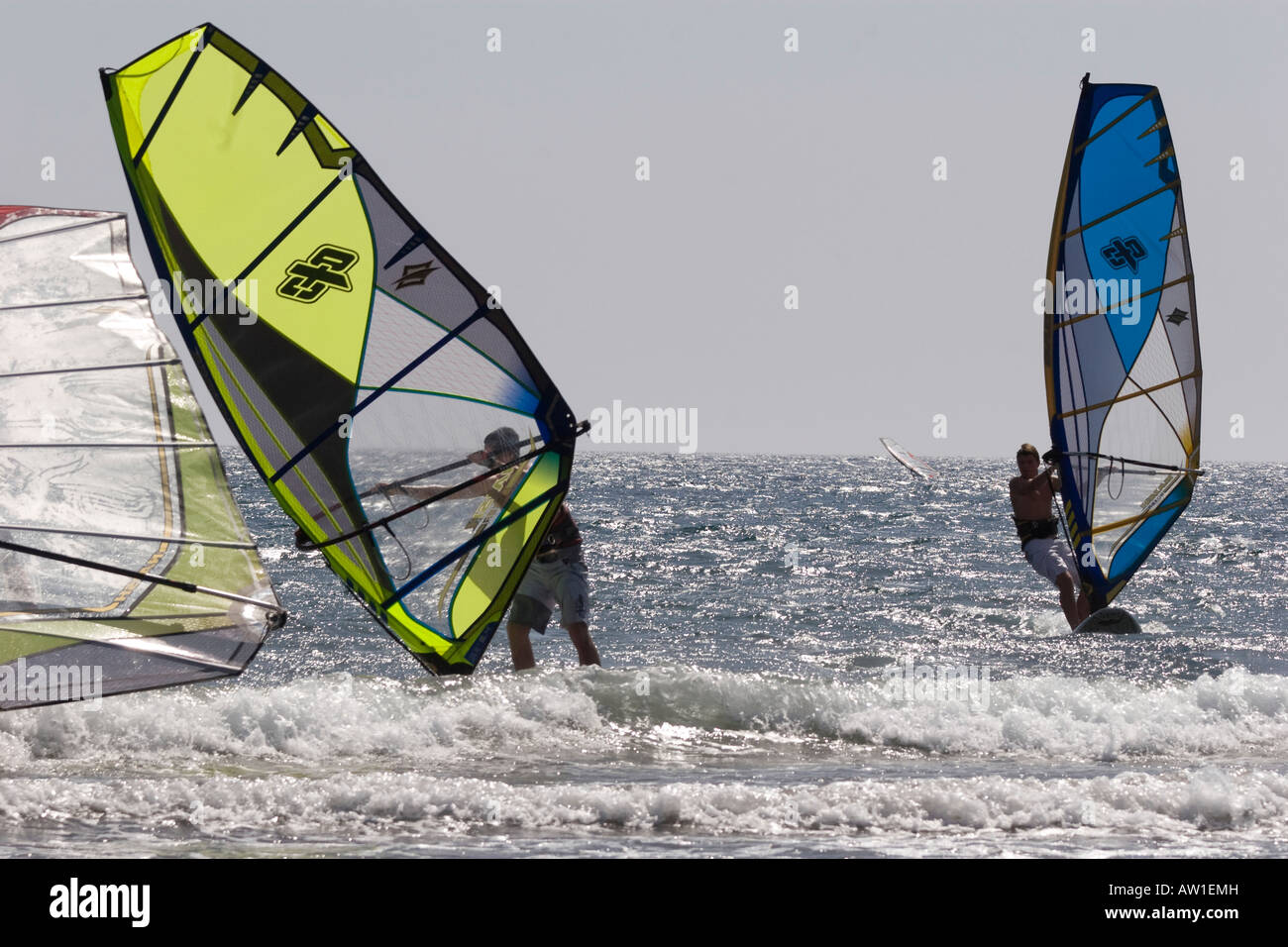Two windsurfers on the water doing freestyle. Photo by Nikki Attree ...