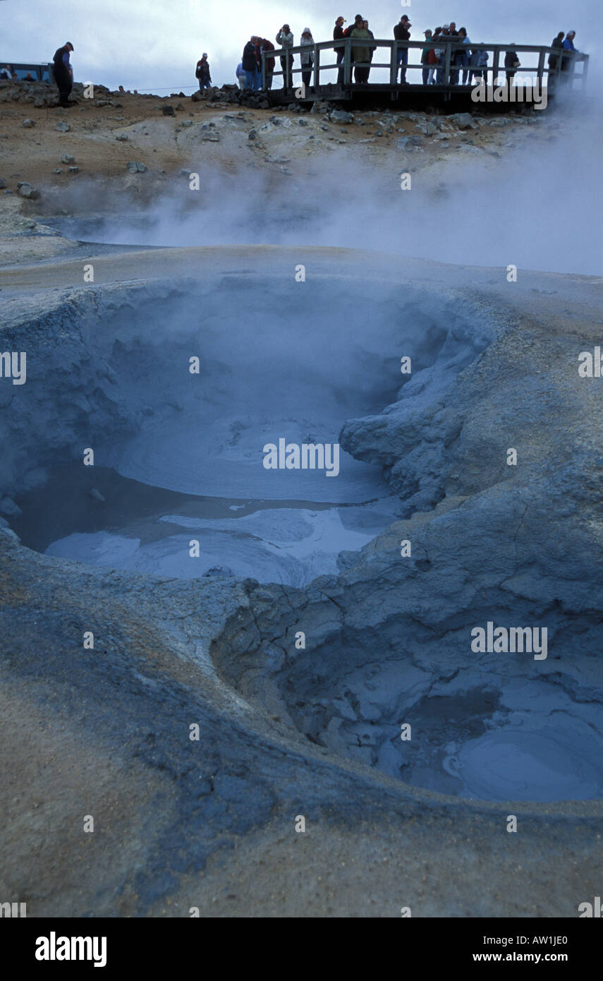 Tourists at bubbling hot geothermal mud pools, Iceland Stock Photo - Alamy