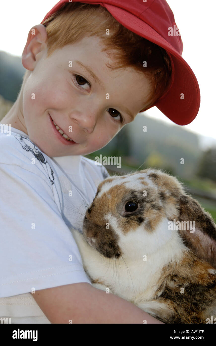 Child with his pet rabbit Stock Photo - Alamy