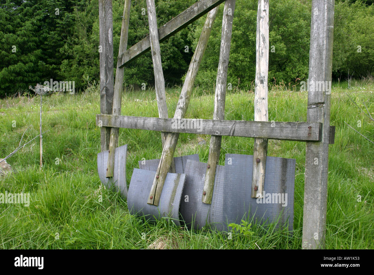 Fire beaters in wood Stock Photo - Alamy