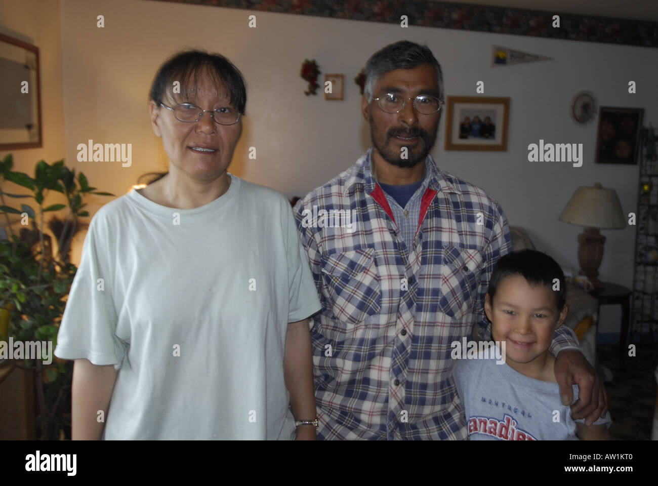 Inuit family at home Father mother and son Stock Photo - Alamy