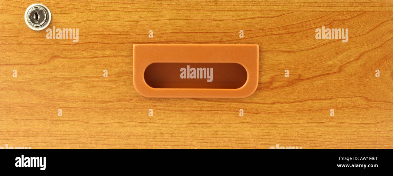 Wooden drawer with lock Stock Photo - Alamy
