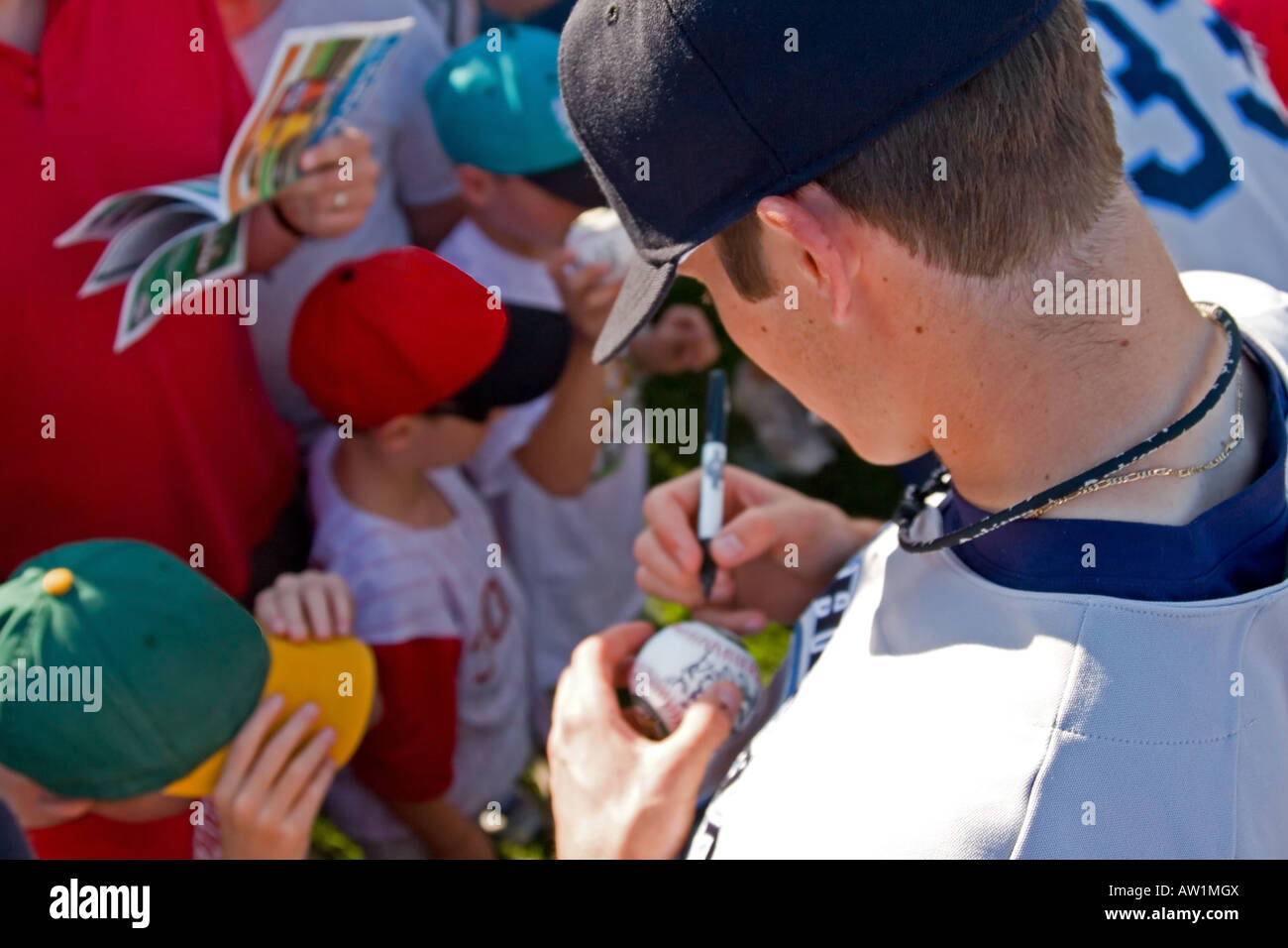 Baseball player signing autographs before a game Stock Photo - Alamy