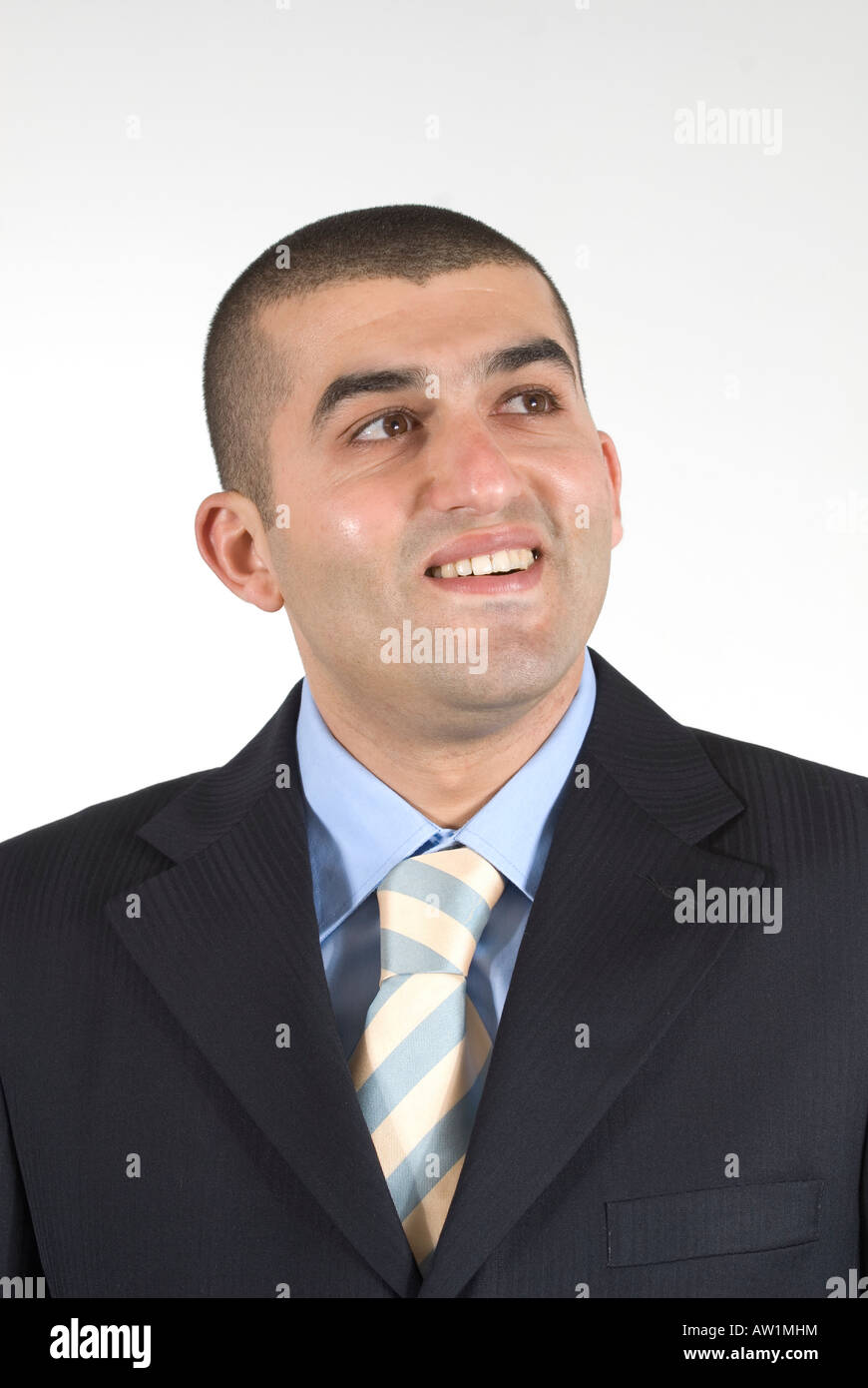 Portrait of a happy business man looking up smiling Stock Photo - Alamy