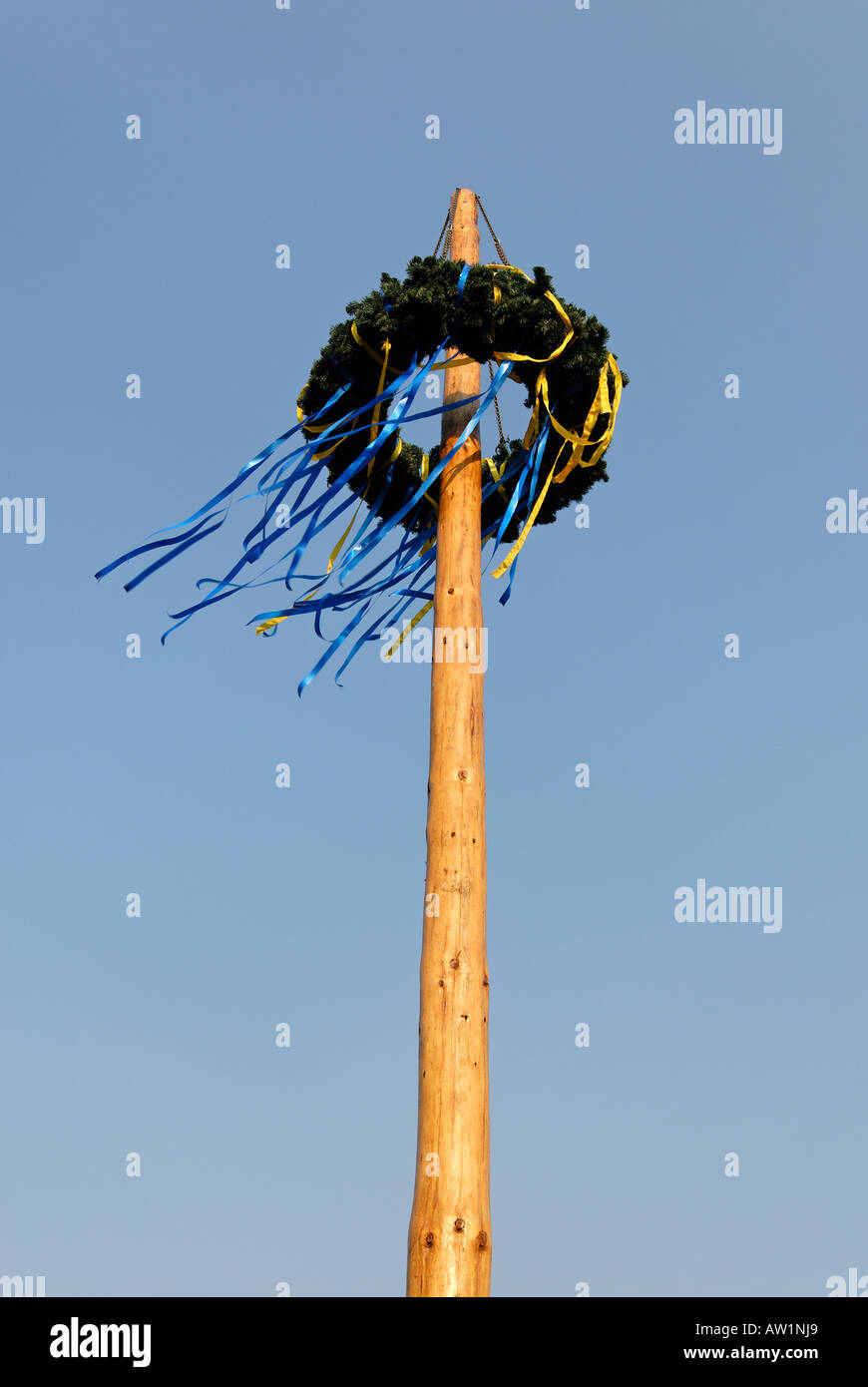 May pole with wreath Stock Photo - Alamy