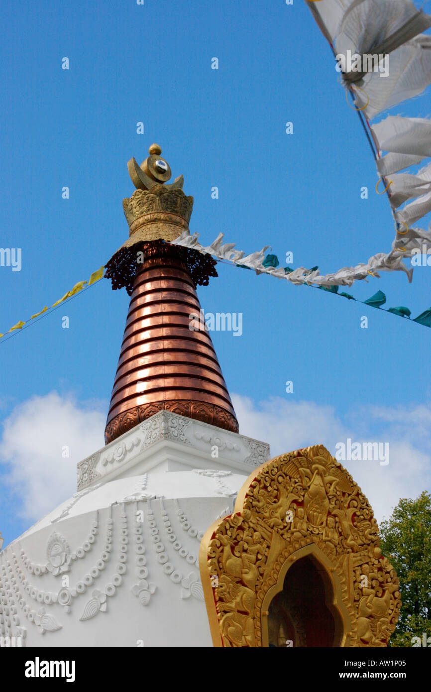Buddhist stupa with prayer flags at Kagyu Samye Ling monastery ...