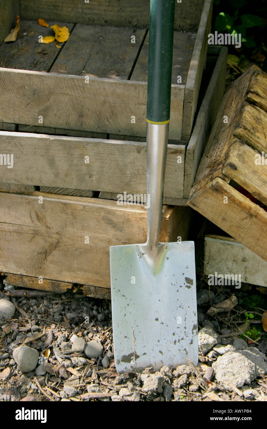 Garden spade and wooden seed boxes Stock Photo - Alamy