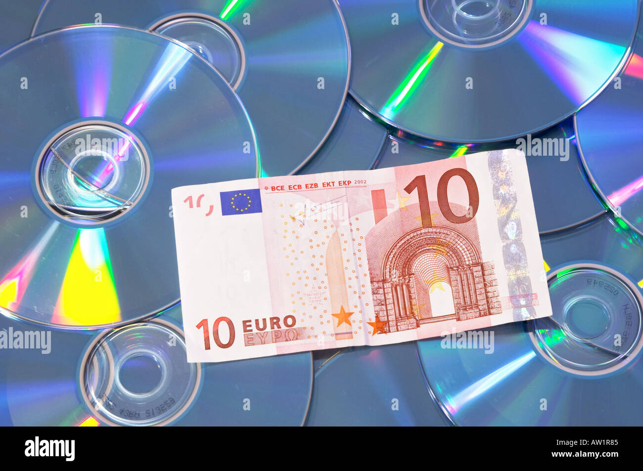 Background of CD compact disk and money Stock Photo - Alamy