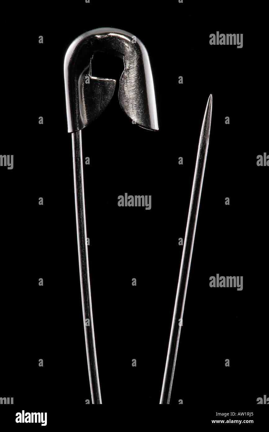 Chrome safety pin Stock Photo - Alamy