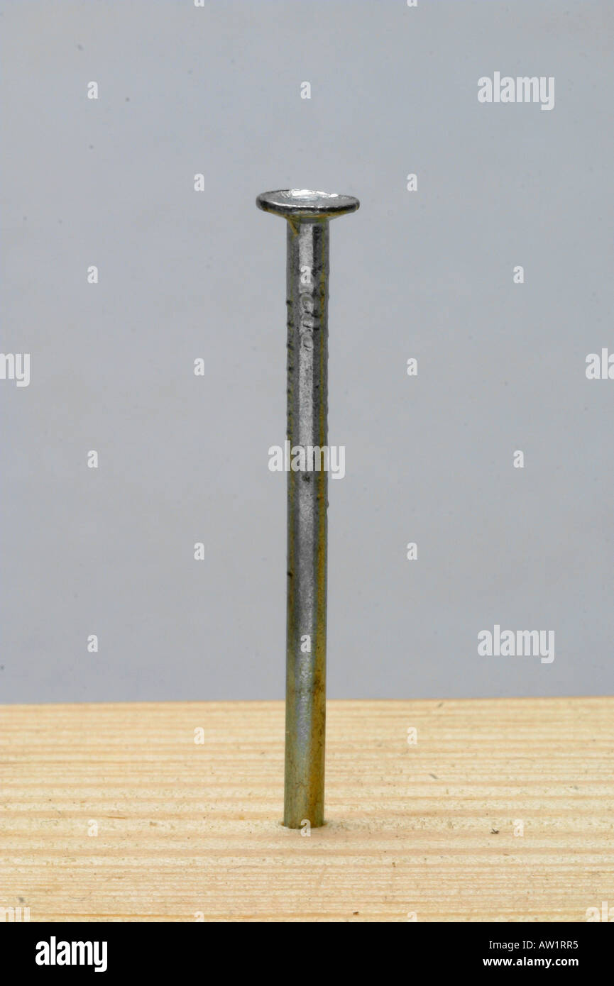 Nail driven into wood hi-res stock photography and images - Alamy