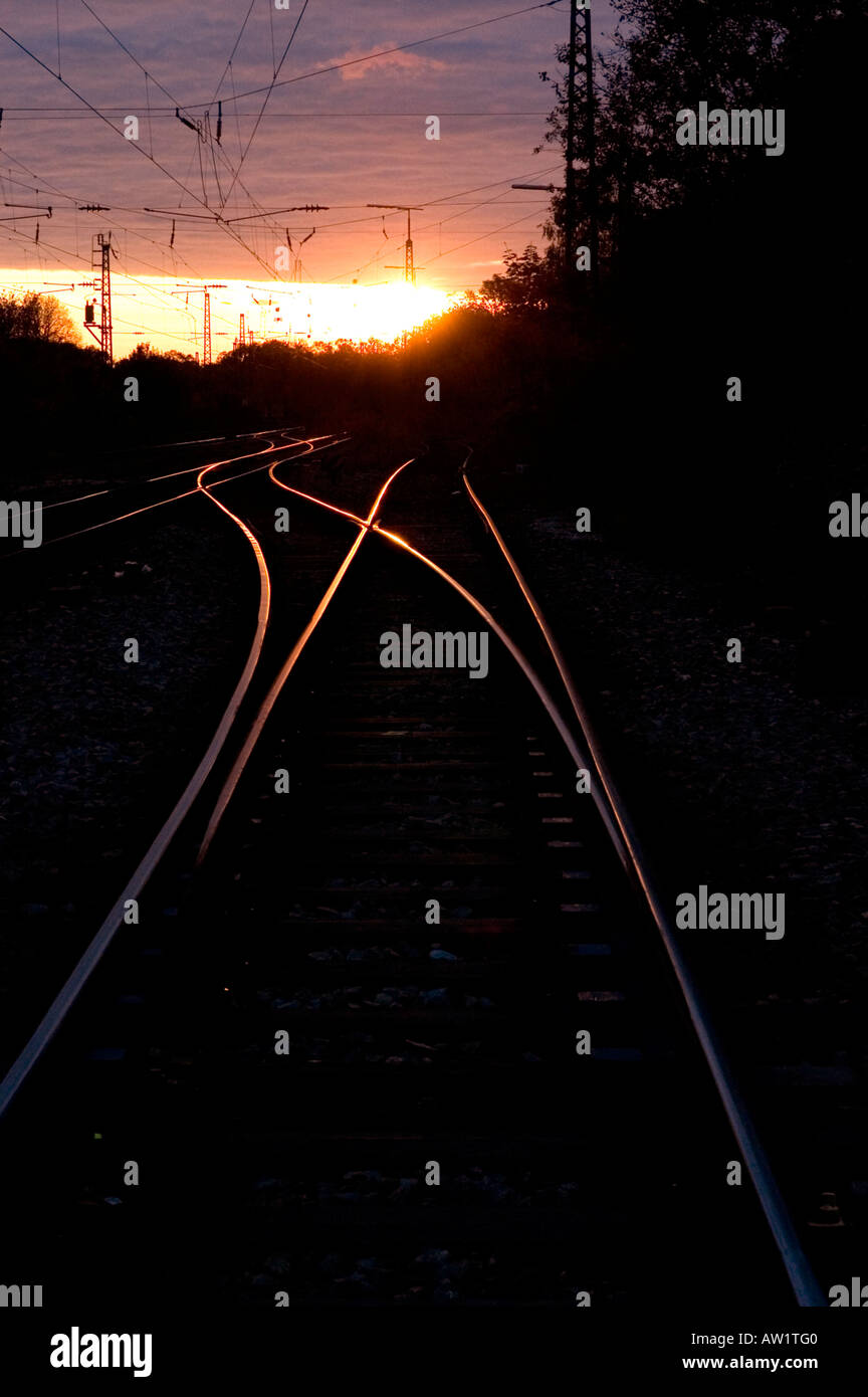 Rail tracks at sunset Stock Photo - Alamy