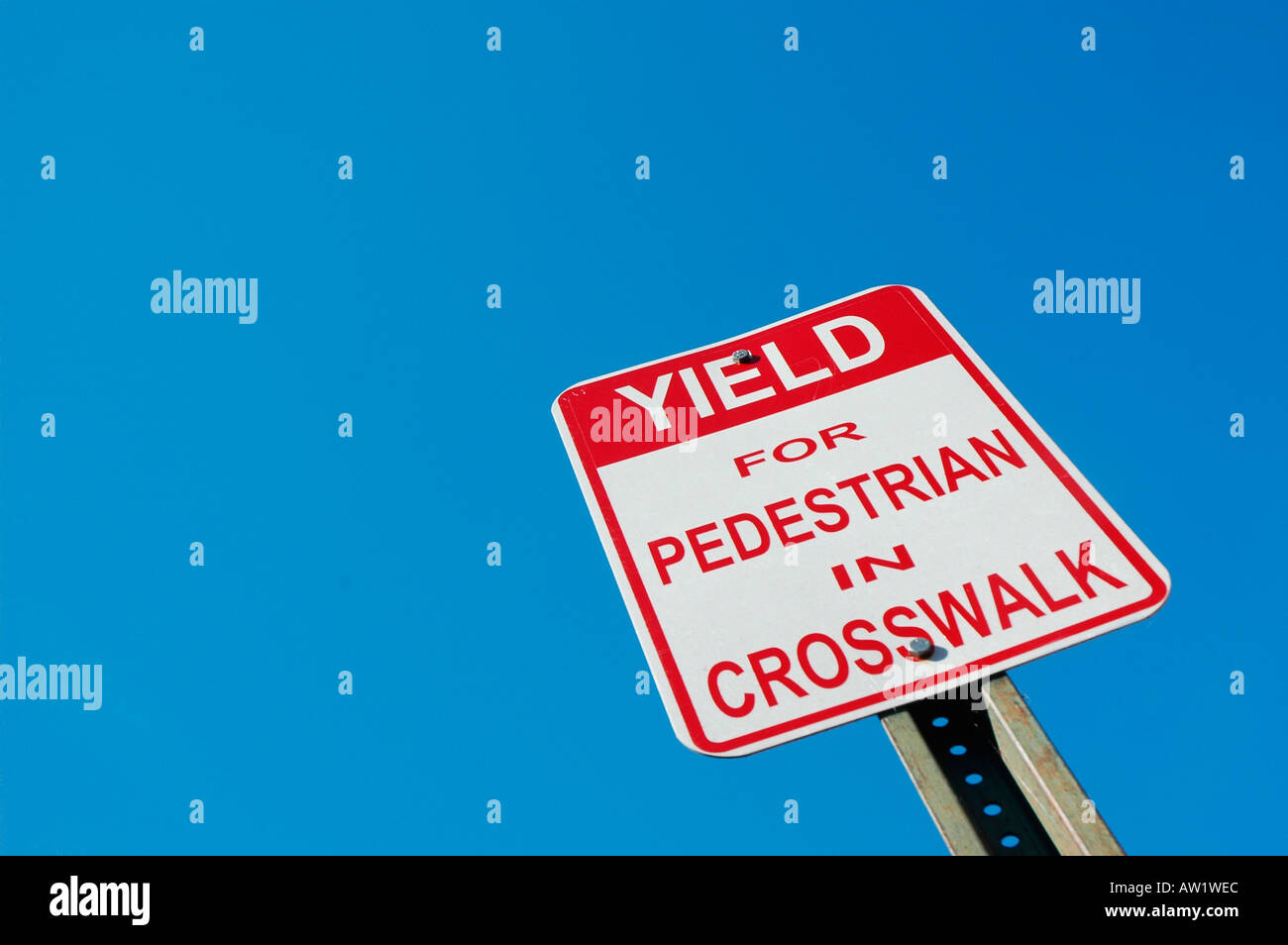 Crosswalk signs on pole hi-res stock photography and images - Alamy