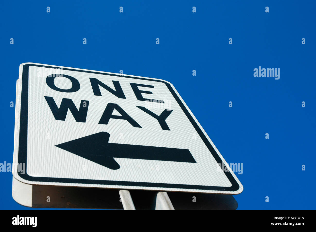 One Way traffic flow arrow, the only way sign on road with arrow ...