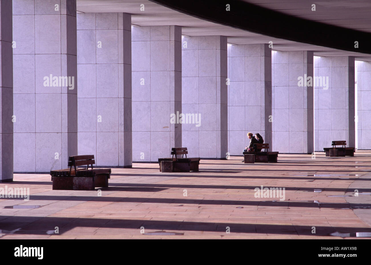 A couple sitting resting at Park Pobedy (Victory Park) in Moscow ...