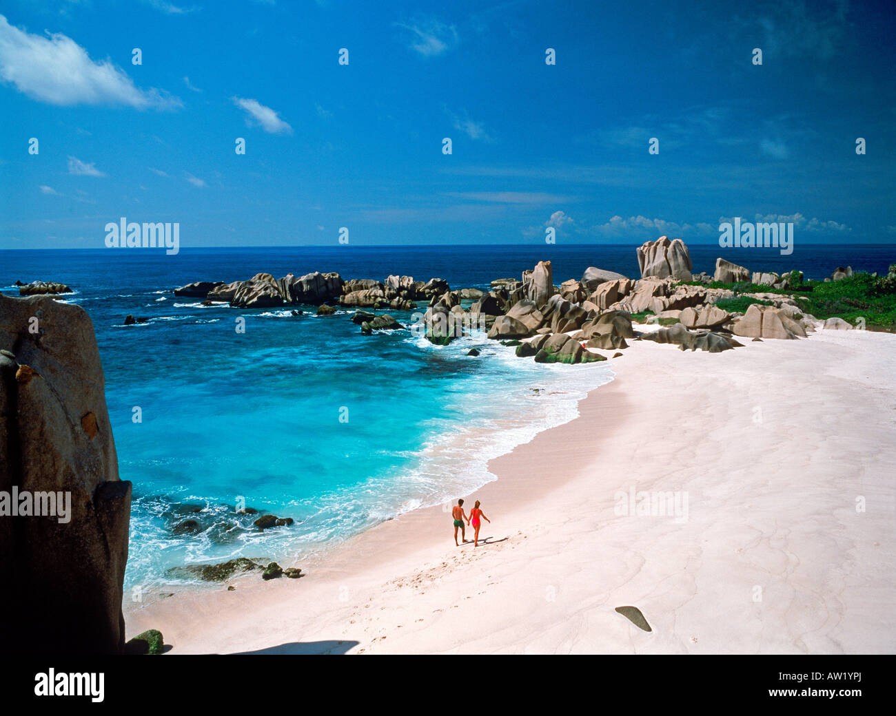 Couple alone in paradise on La Digue Island in the Seychelles Stock ...