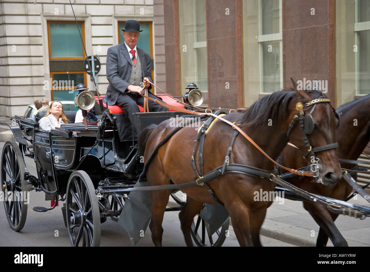 Horse drawn carriage with driver Fiaker Vienna Austria Stock Photo - Alamy