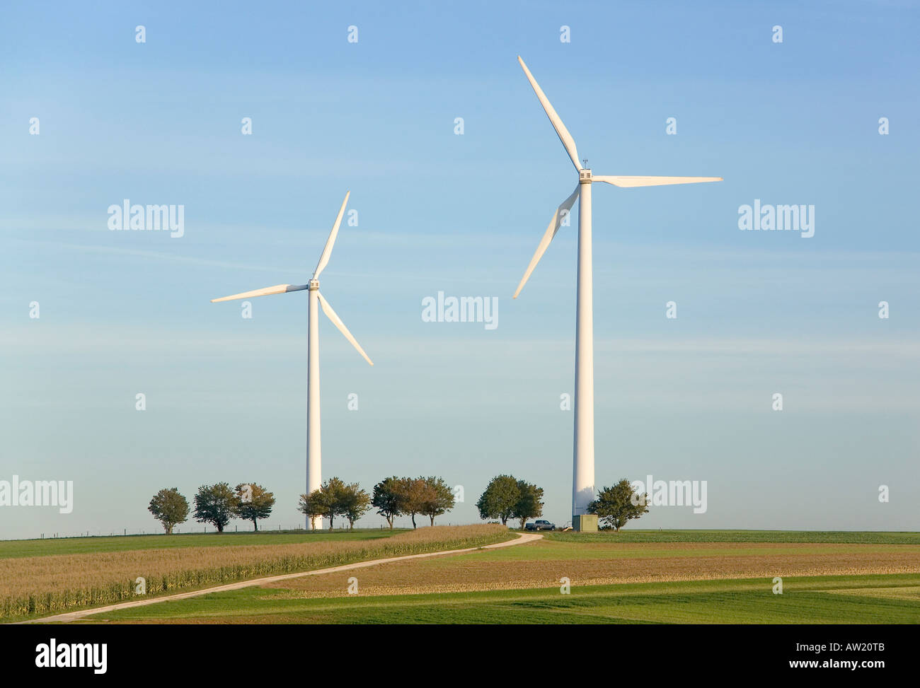 Two wind wheels on a hill Stock Photo - Alamy