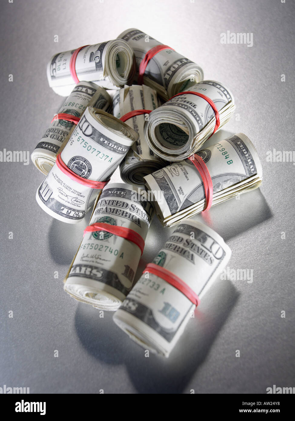 Pile of banknote rolls Stock Photo - Alamy