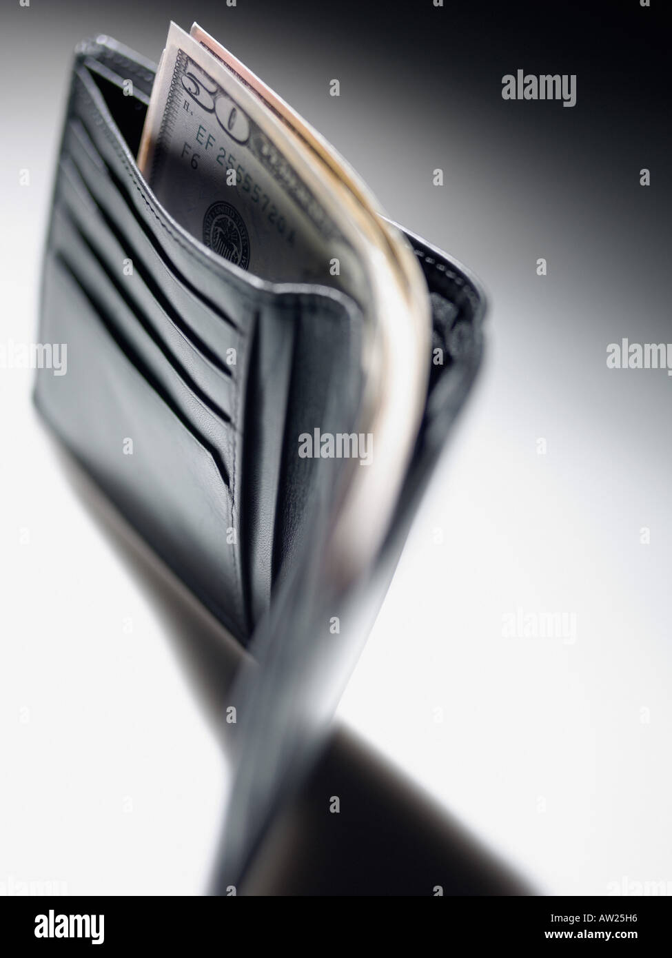 Money in a wallet hi-res stock photography and images - Alamy