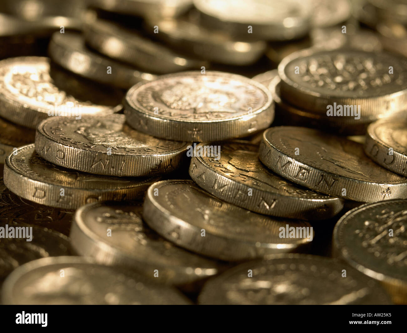 Lots of pound coins hi-res stock photography and images - Alamy
