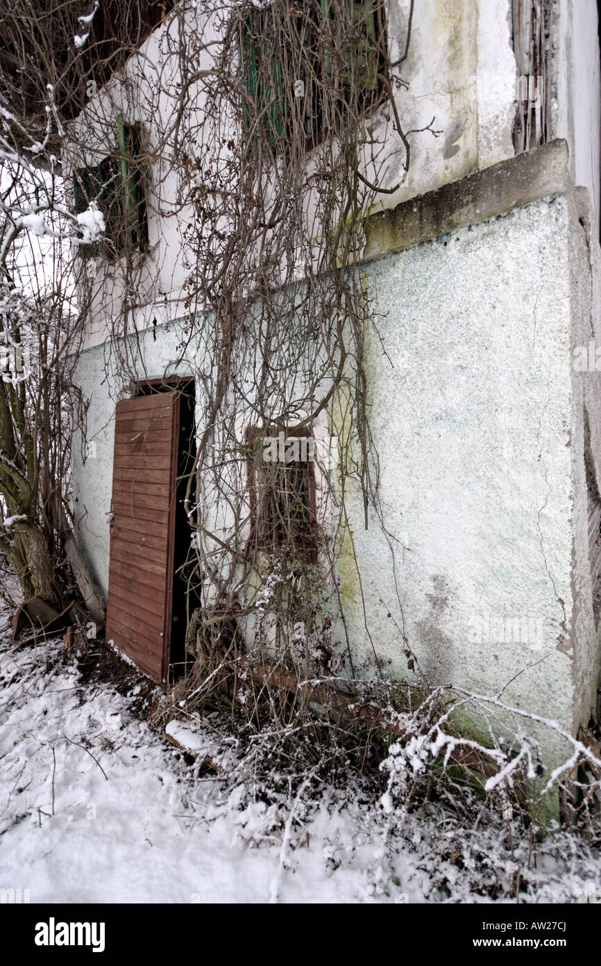 Derelict house in snow Stock Photo - Alamy