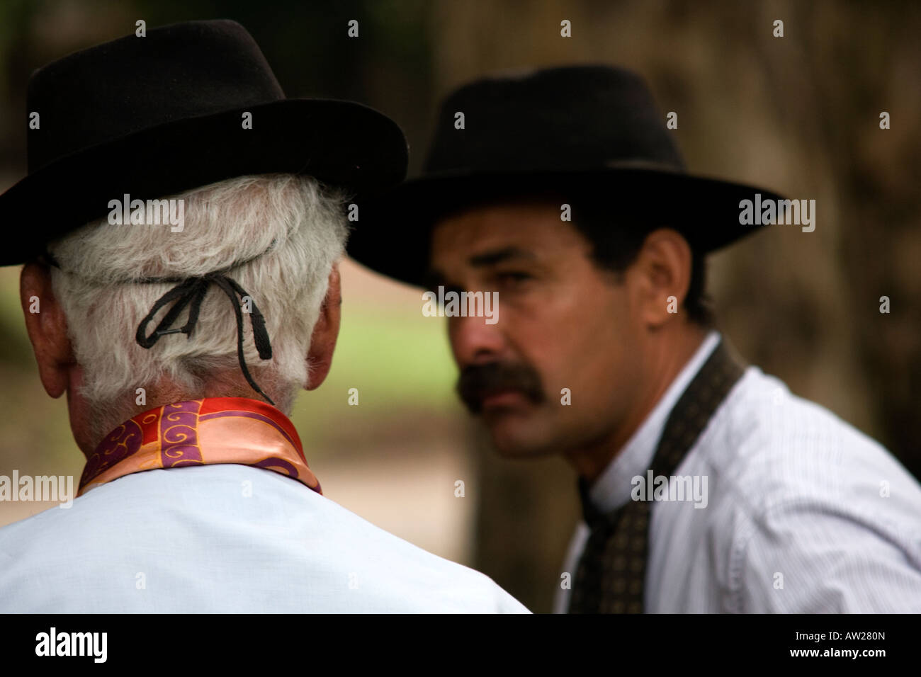 Two gauchos having a conversation in the town of San Antonio de Areco ...