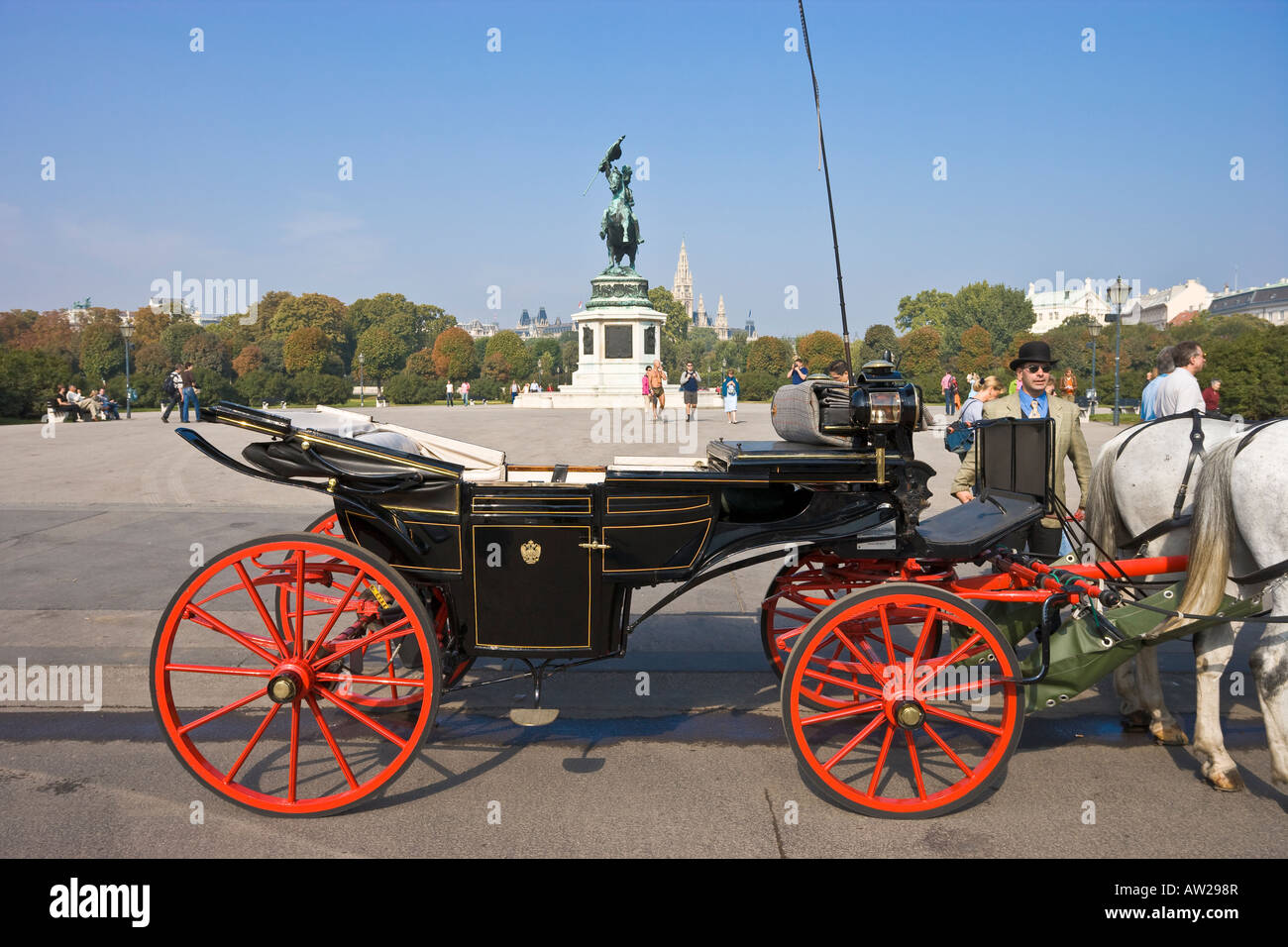 Horse drawn carriage Fiaker Statue of Archduke Charles of Austria on ...