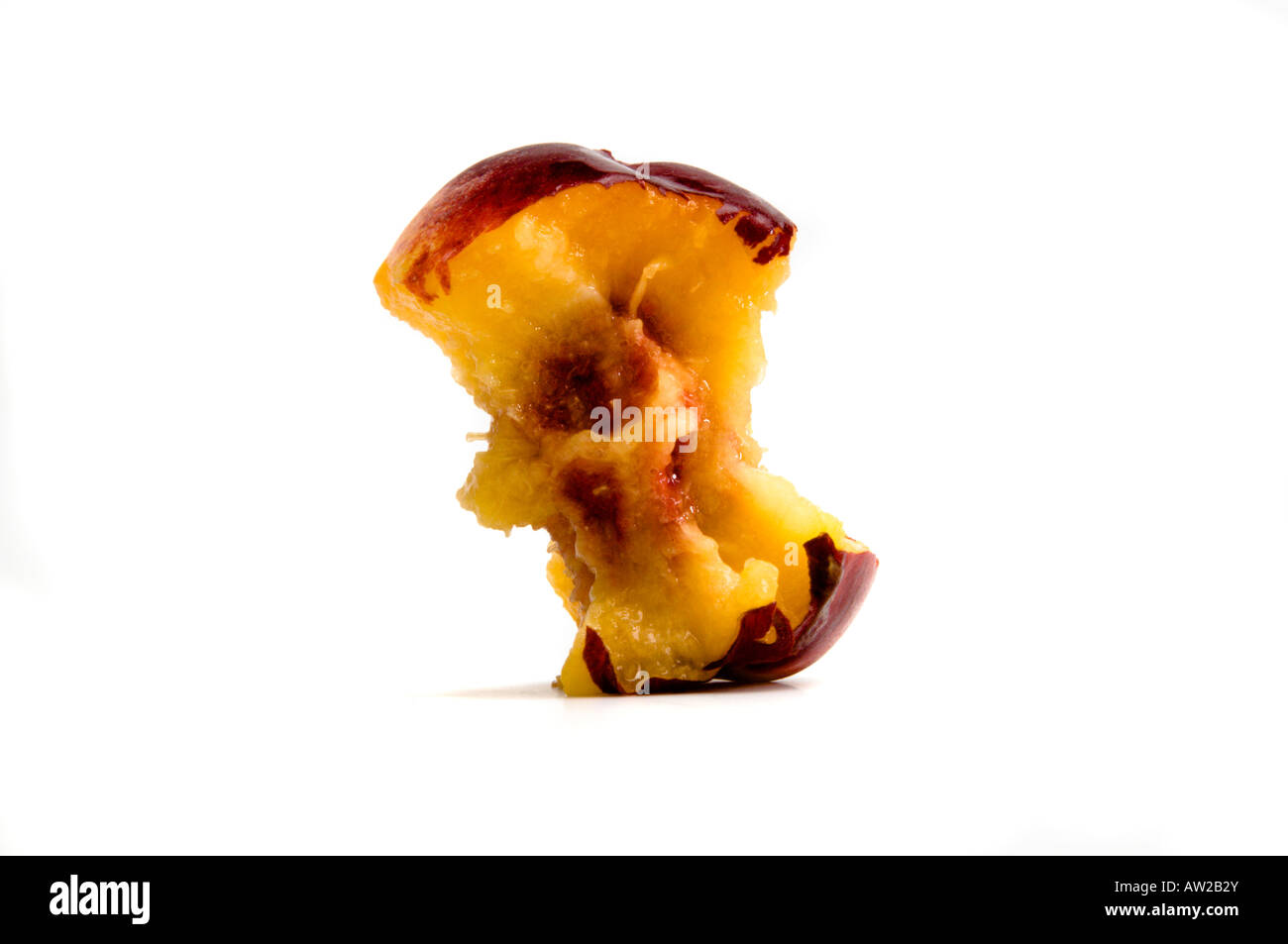 A studio shot of the core of an eaten piece of fruit Stock Photo - Alamy