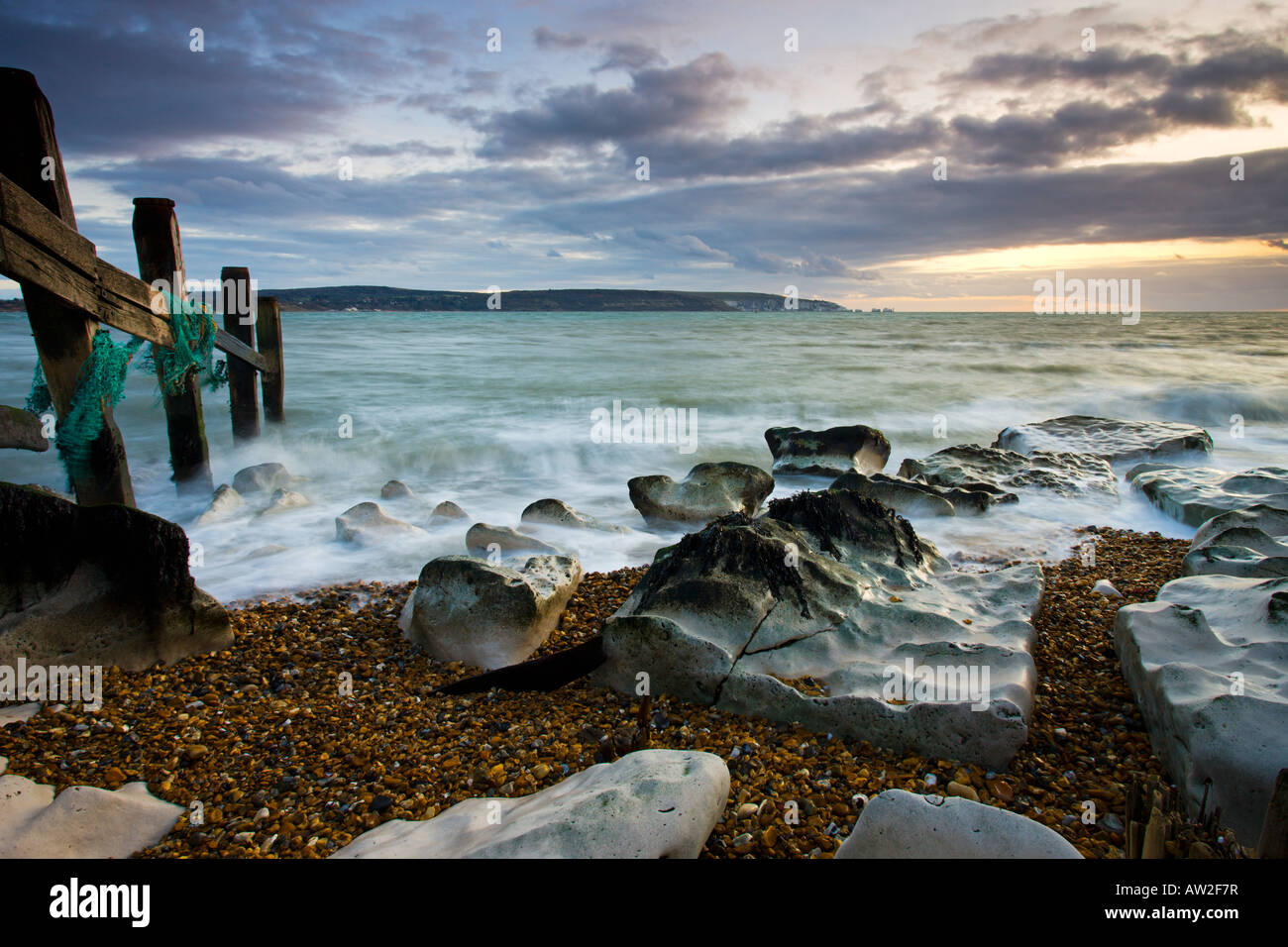 Sea defences at Hurst Spit looking across to the Isle of Wight and the ...