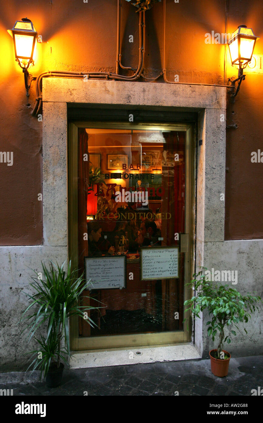Atmospheric entrance to a traditional Italian restaurant Trattoria ...