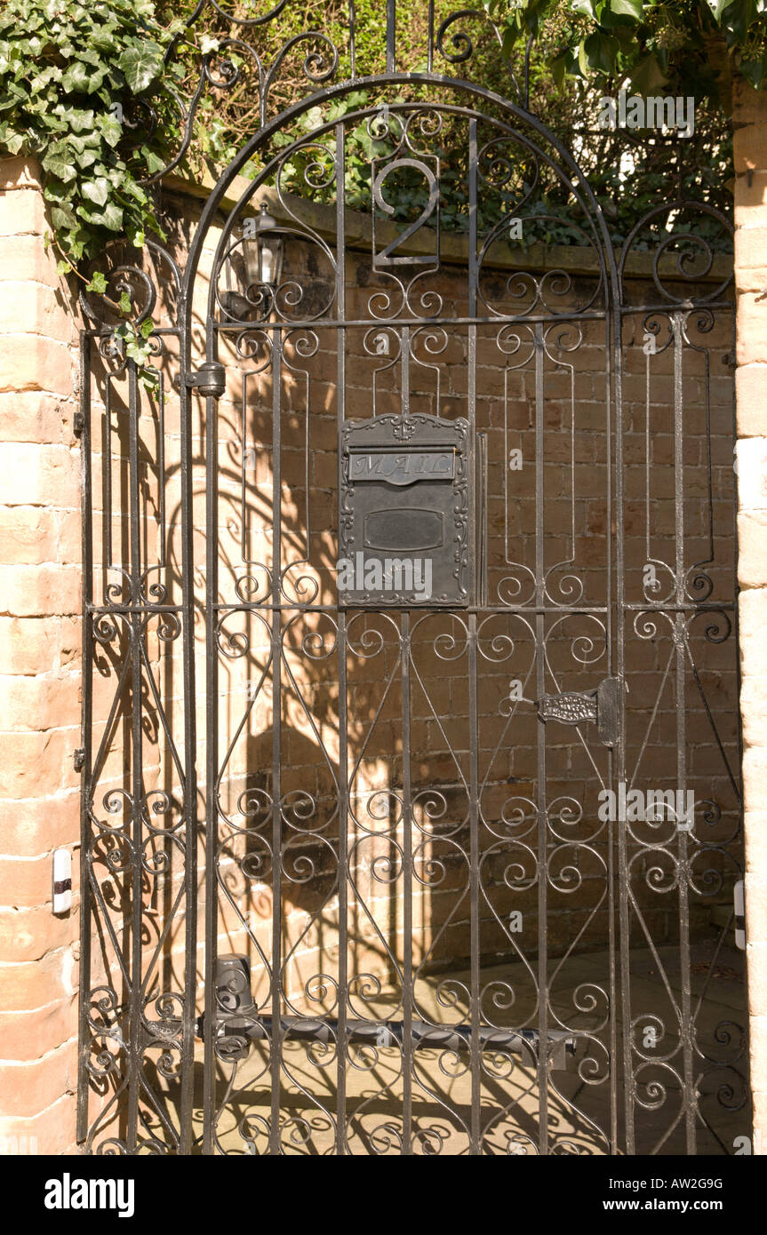 Black wrought iron gate hi-res stock photography and images - Alamy