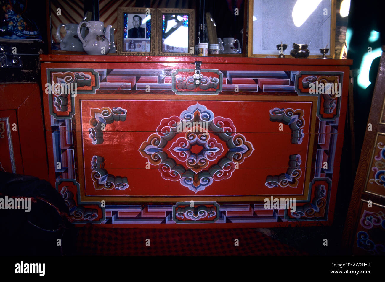 Chest of drawers with typical Mongolian ornamentation inside a ger tent ...