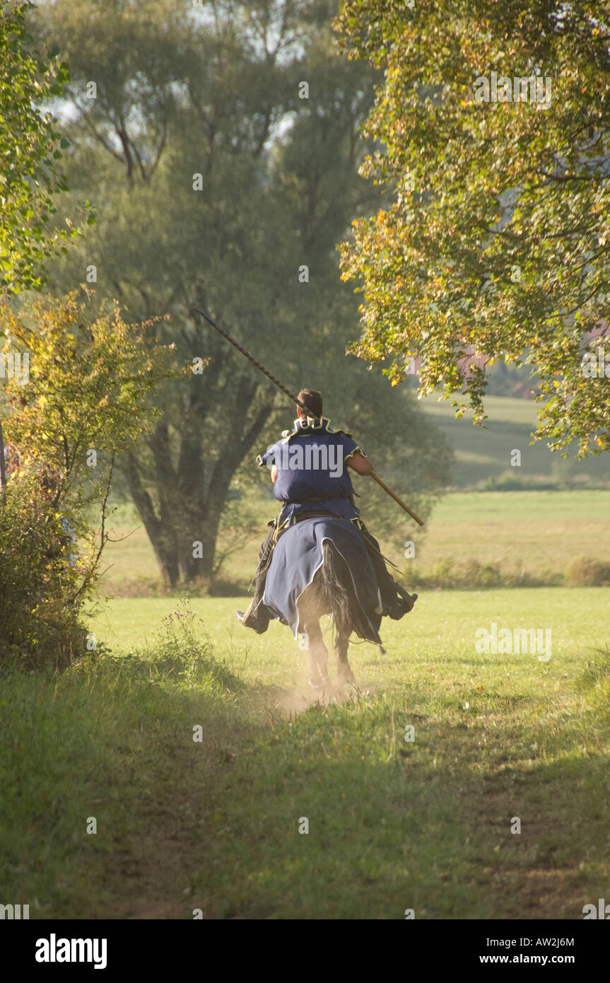 Horseman riding into the distance at the Cerknitca jousting tournament ...