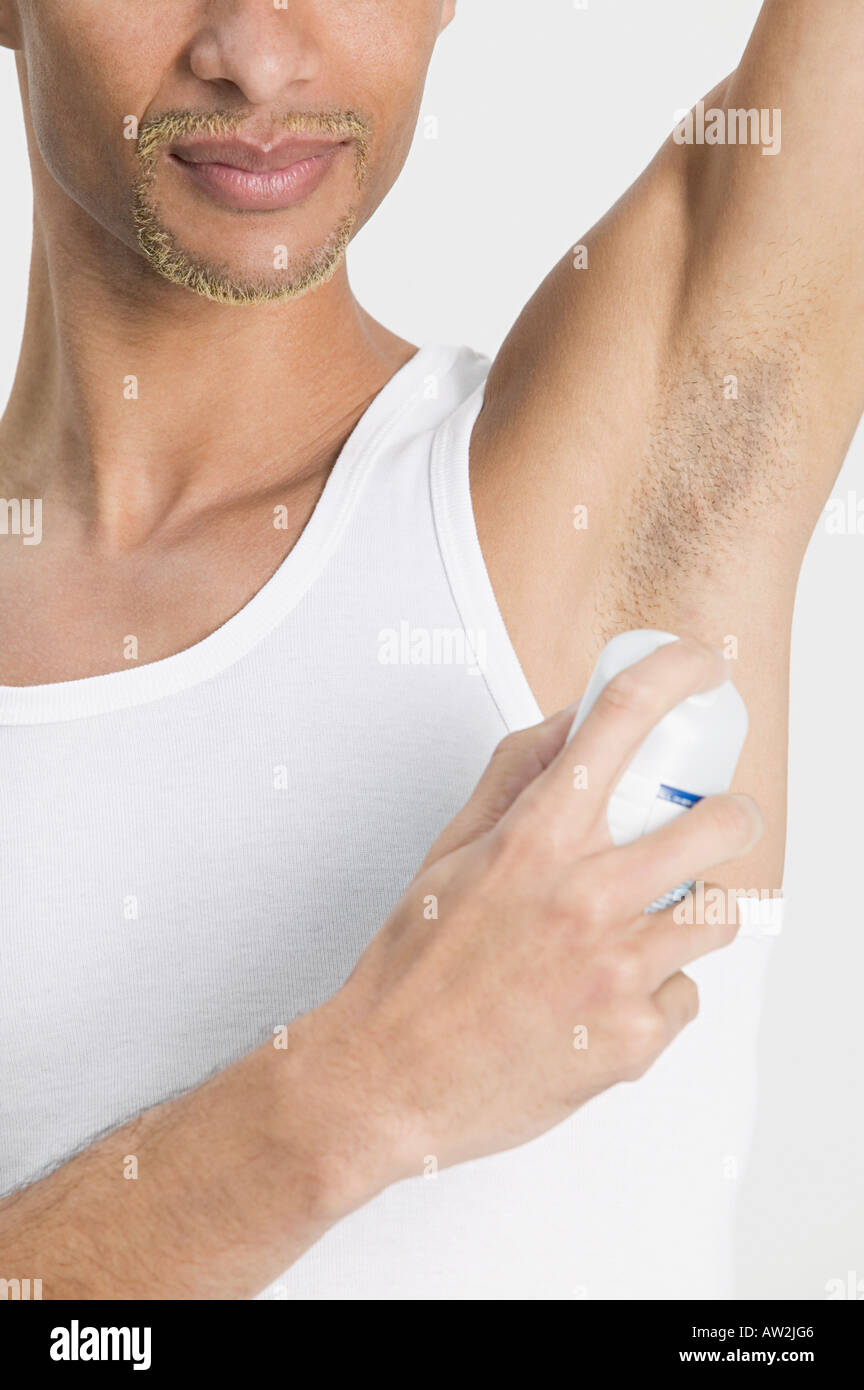 Man spraying armpit hi-res stock photography and images - Alamy