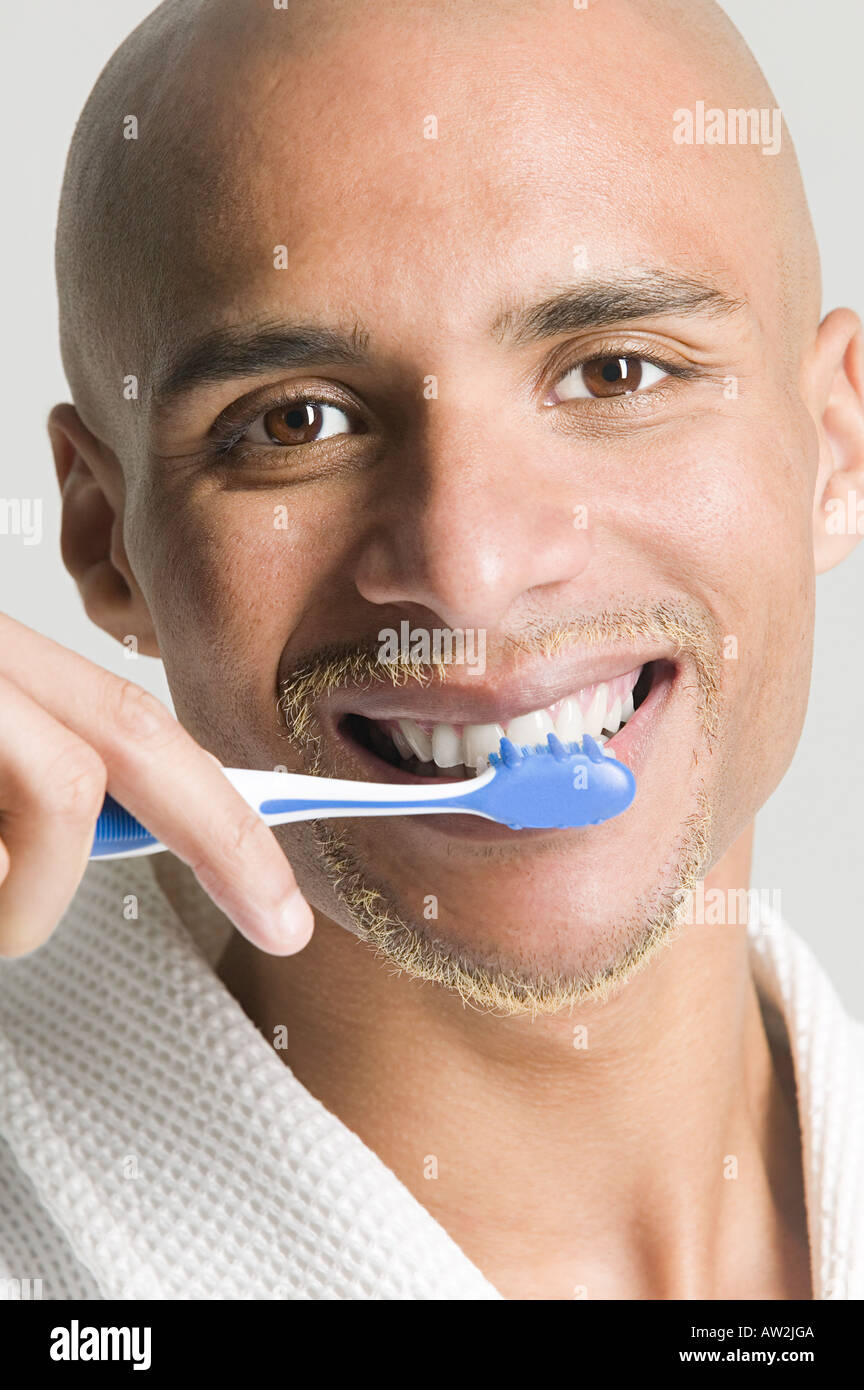 Man brushing his teeth Stock Photo - Alamy