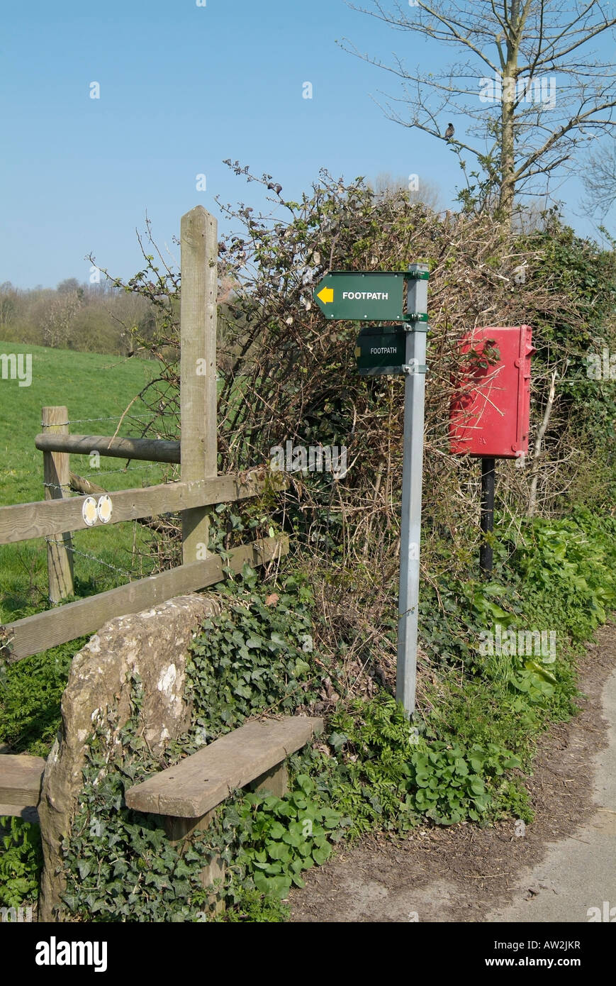 English village footpath with stile and Victorian postbox Stock Photo ...