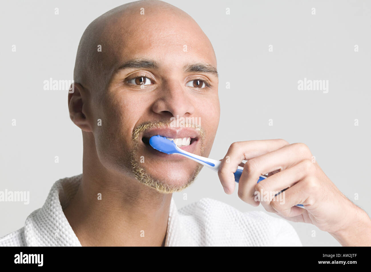 Man brushing his teeth Stock Photo - Alamy