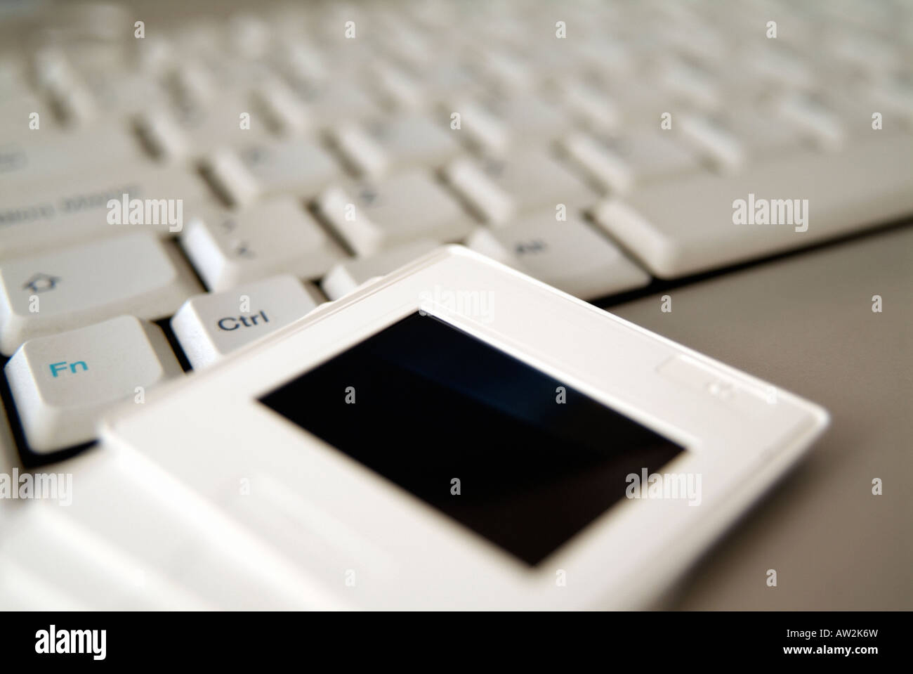Film mounted slides over a laptop keyboard Stock Photo - Alamy