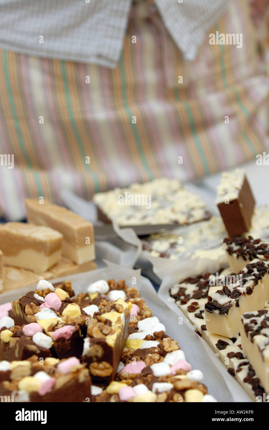 a stall stand selling and displaying for sale home made confectionery ...