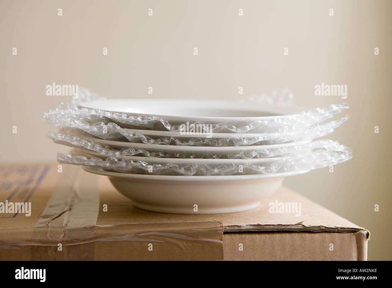 Bowls ready for packing Stock Photo - Alamy