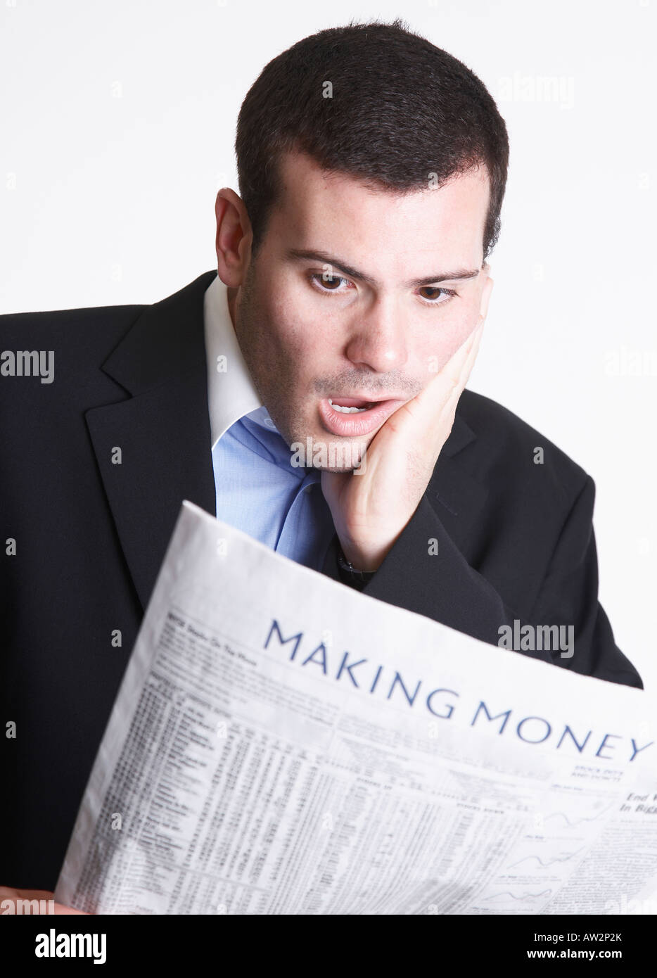 Reading open newspaper financial hi-res stock photography and images ...