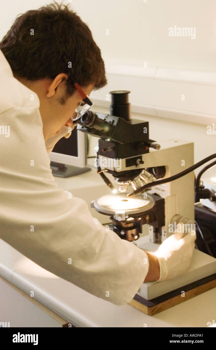 Boy microscope white coat hi-res stock photography and images - Alamy