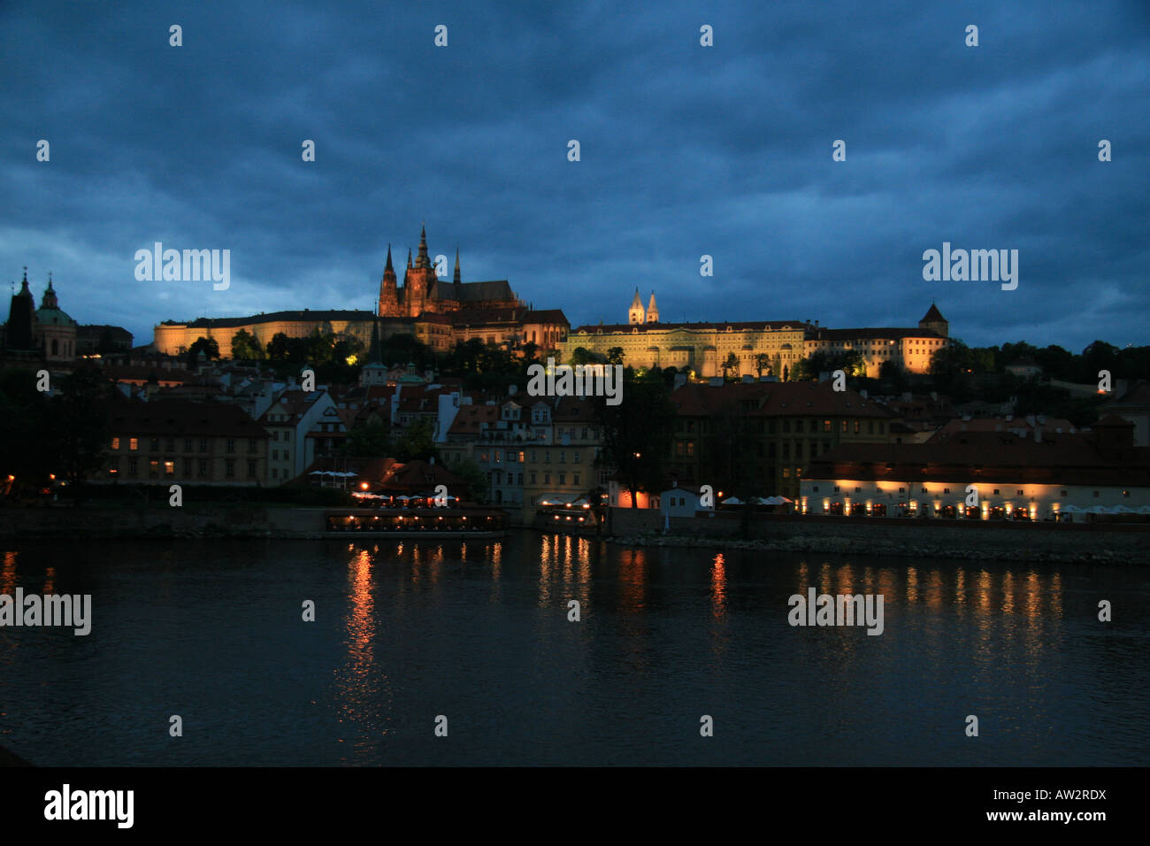 Sunset over Prague Castle as seen from the Charles Bridge Stock Photo ...