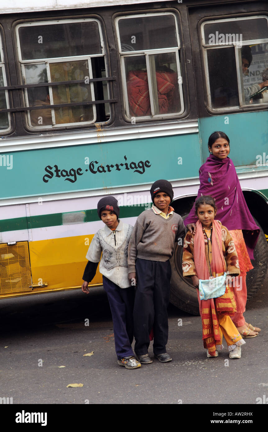 Sunday afternoon in New Delhi India A family on their way to the bus ...